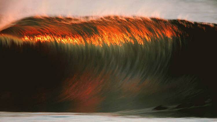 Watch a Huge Wave Take Out THIS Reporter | The Weather Channel