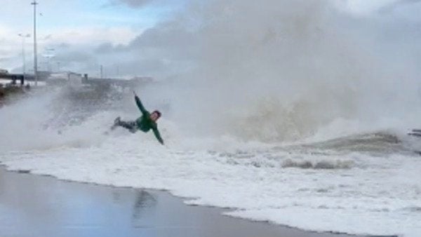 Storm Ciarán Wave Knocks Man Off His Feet - Videos from The Weather Channel