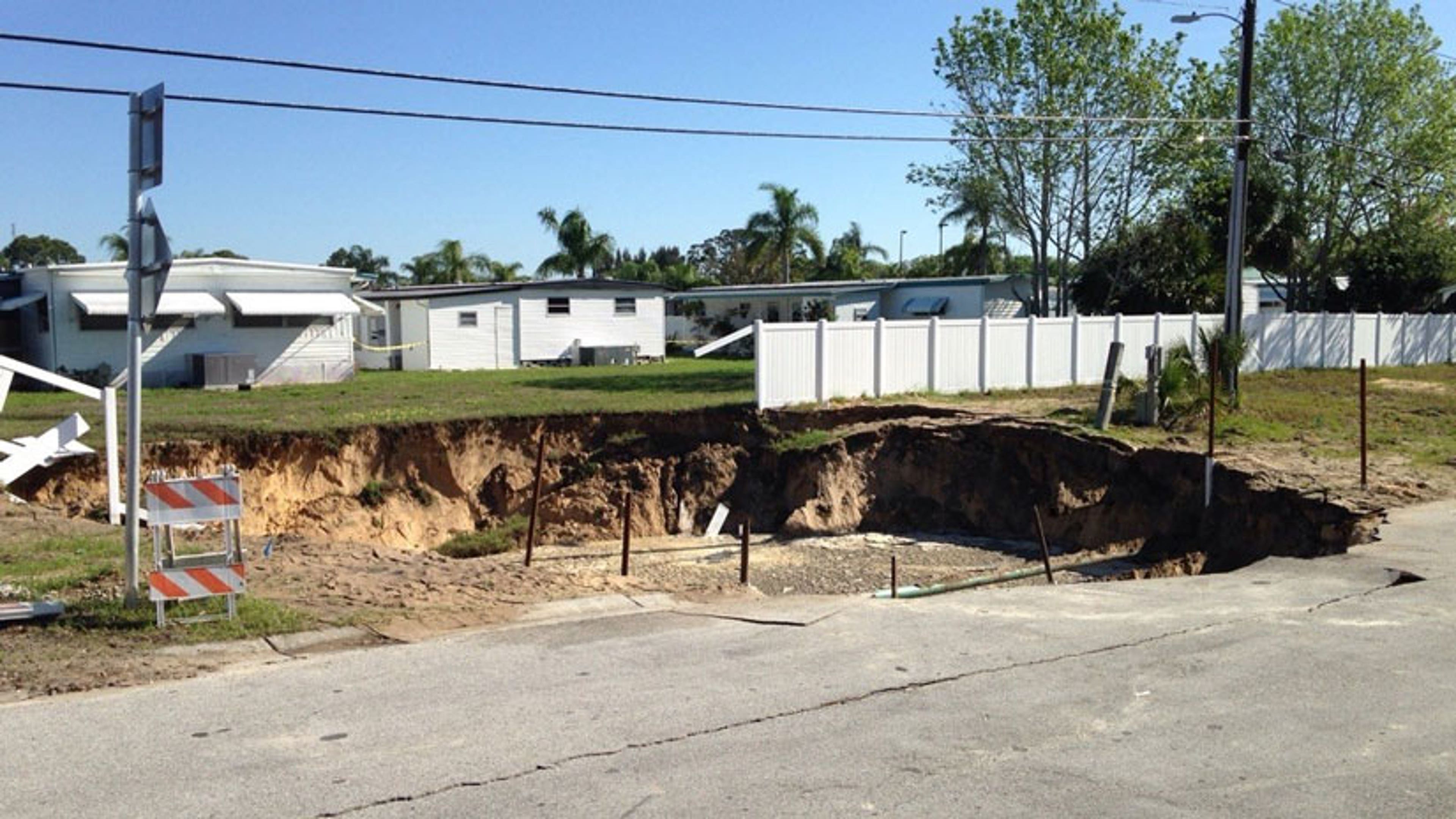 Sinkhole Forces Evacuations in Tarpon Springs, Florida | The Weather ...
