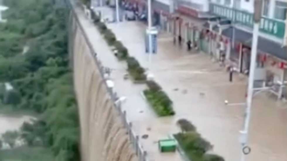 Flooding Creates Insane Waterfall in Pedestrian Area - Videos from The ...