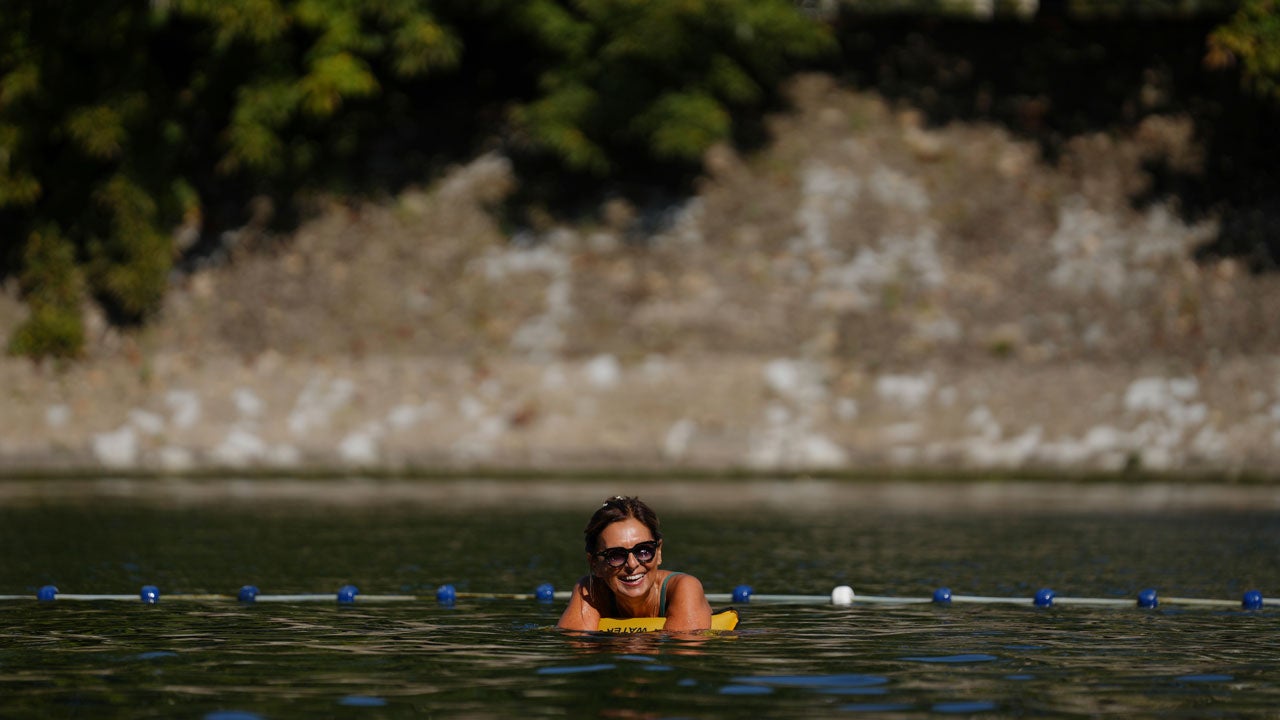 Seine River Greets Swimmers As Paris Stifles In Heat Wave | Weather.com