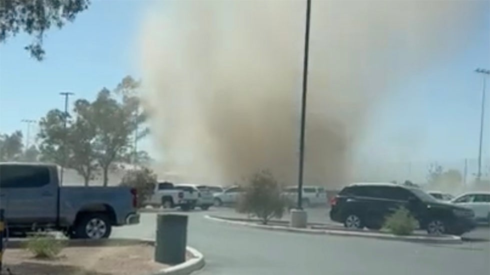 Dust Devil Kicks Up Debris as it Crosses Highway - Videos from The ...