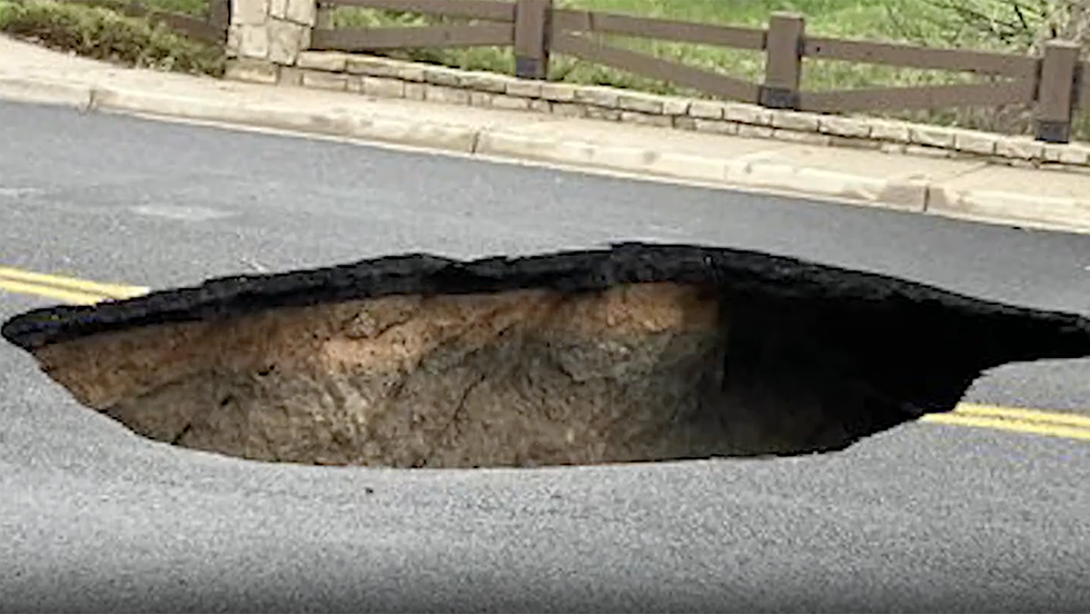 Awed Onlookers Record Sinkhole Collapse - Videos from The Weather Channel