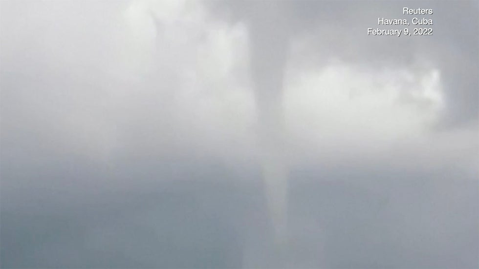 Ominous Waterspout Moves onto Land, Causing Damage in Capital City ...