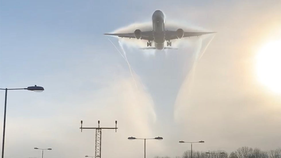 Jet Emerges From Fog Like a Mythical Beast - Videos from The Weather ...