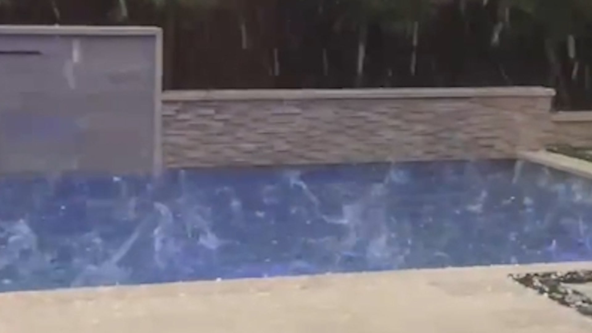Watch: Huge Hail Crashes Into Texas Pool - Videos from The Weather Channel