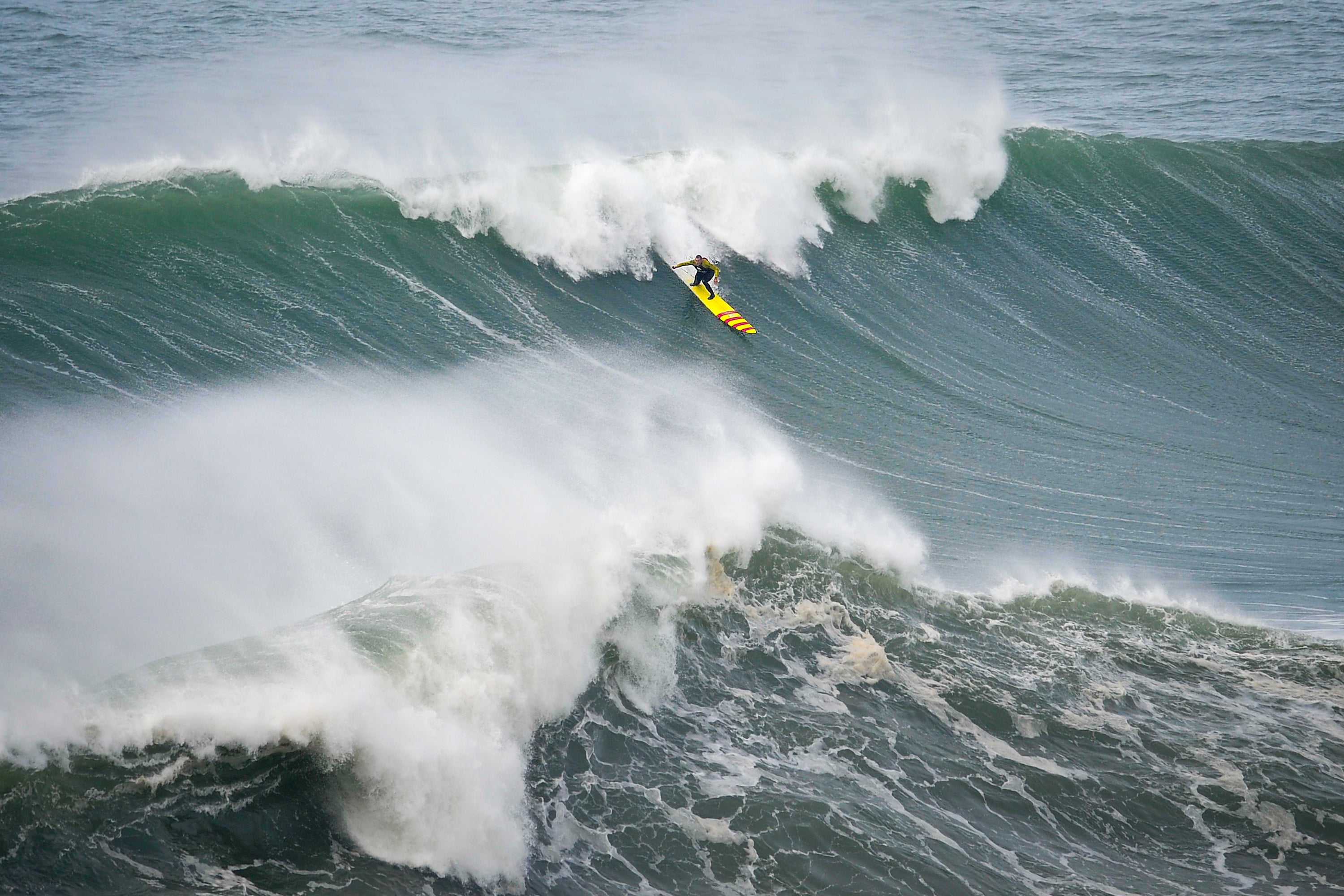 Hawaiian Surfer Wrangles Massive Wave | The Weather Channel