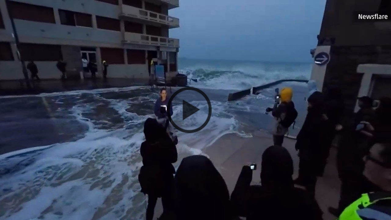 Watch a Huge Wave Take Out THIS Reporter | The Weather Channel
