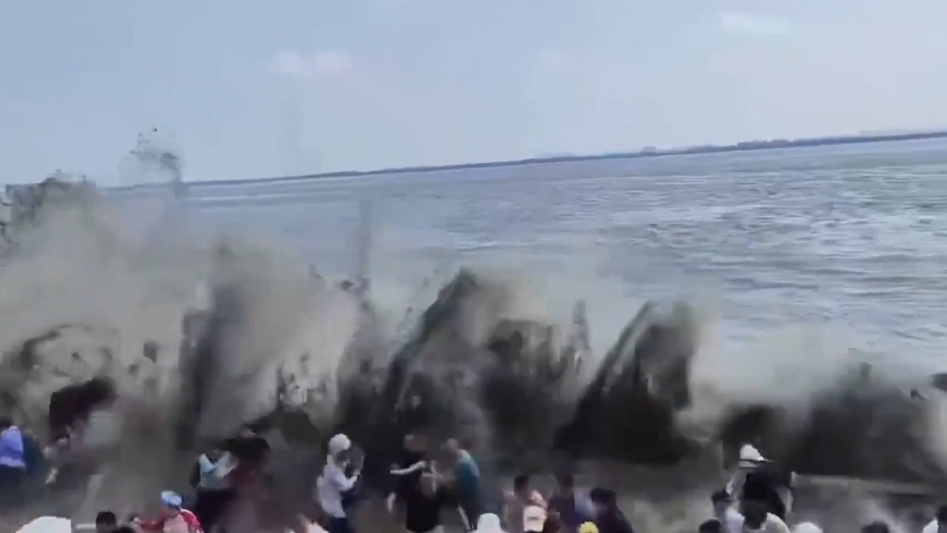 Gathered To Watch Huge Wave, Wiped Out - Videos from The Weather Channel