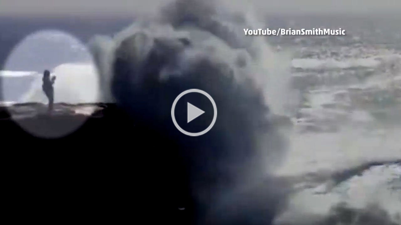 Watch Giant Wave Knock Spectator Off Cliff | The Weather Channel